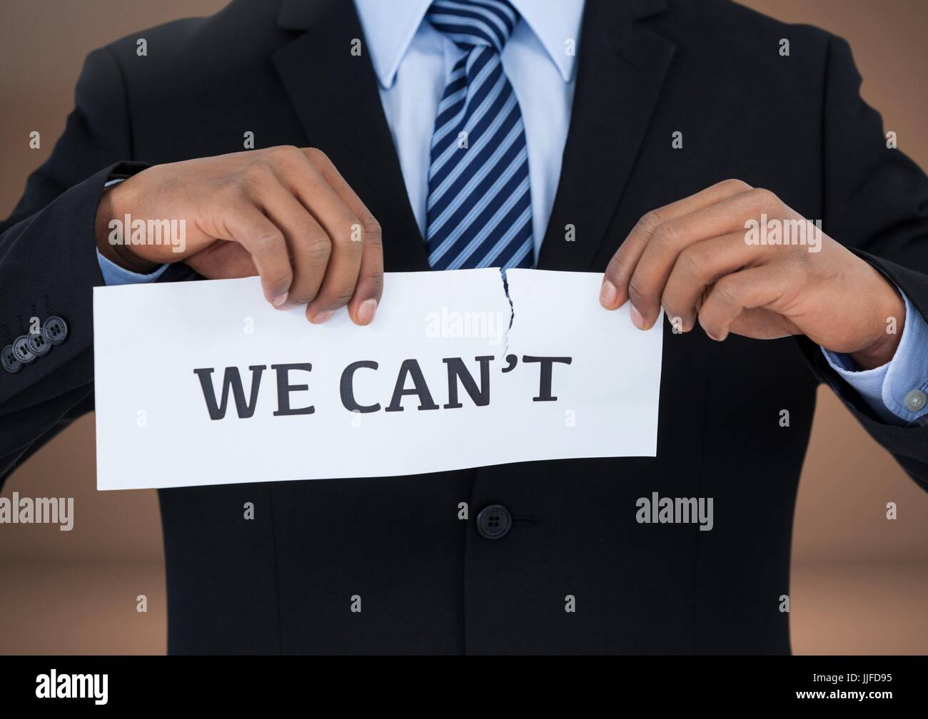 Ripping clothes hi-res stock photography and images - Alamy