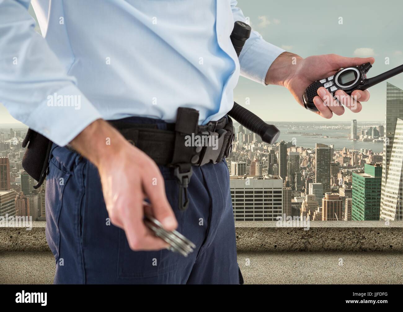 Digital composite of security guard in the rooftop of the building ...