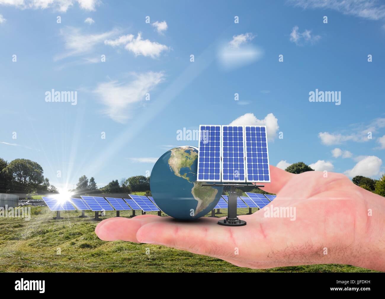 Digital composite of solar panel and earth on hand near the lake Stock ...