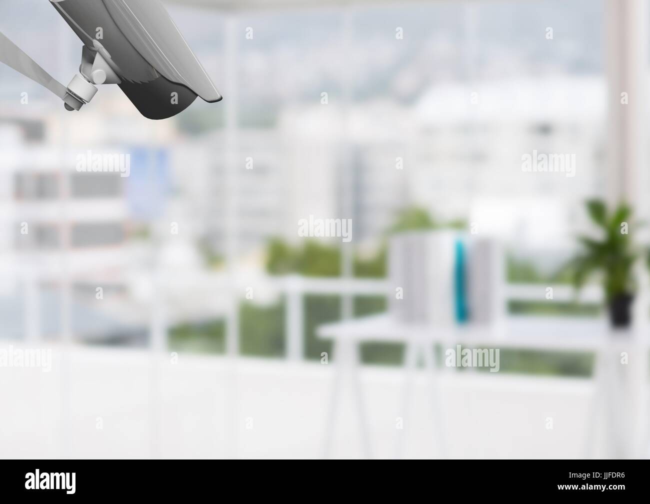 Digital composite of cctv, light office blurred Stock Photo - Alamy