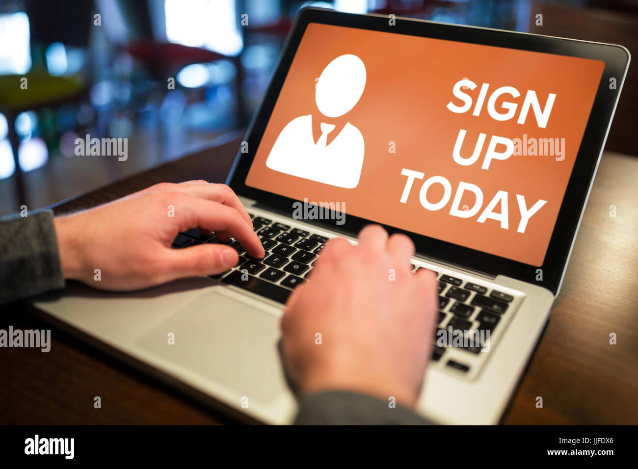 Sign Up Now text with human icon on brown screen against cropped image ...
