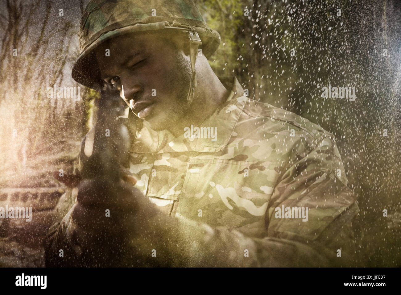 Man aiming green water gun hi-res stock photography and images - Alamy