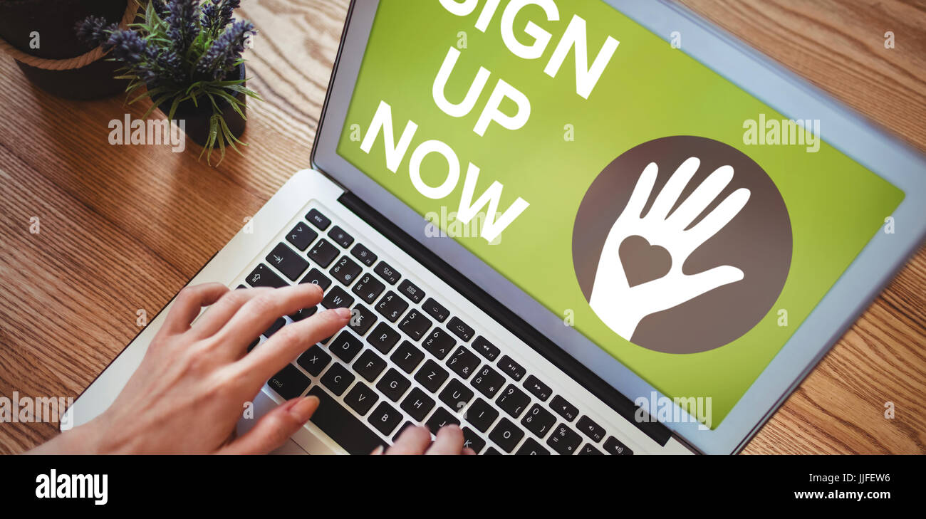 Sign Up Now text with icons on green screen against hands of woman ...