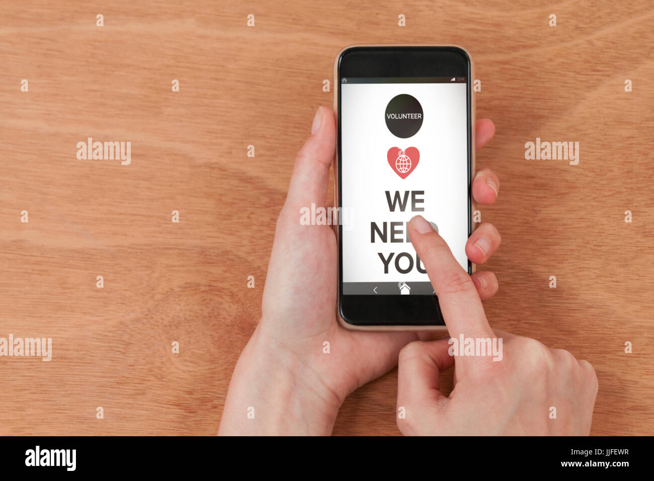 Vector image of We Need You text with icons against hands using smart ...
