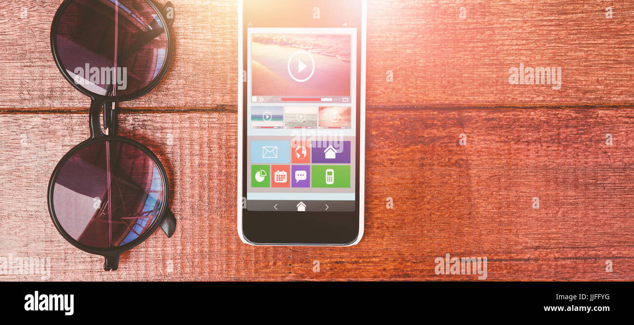 Illustration of video player with various icons against view of glasses ...