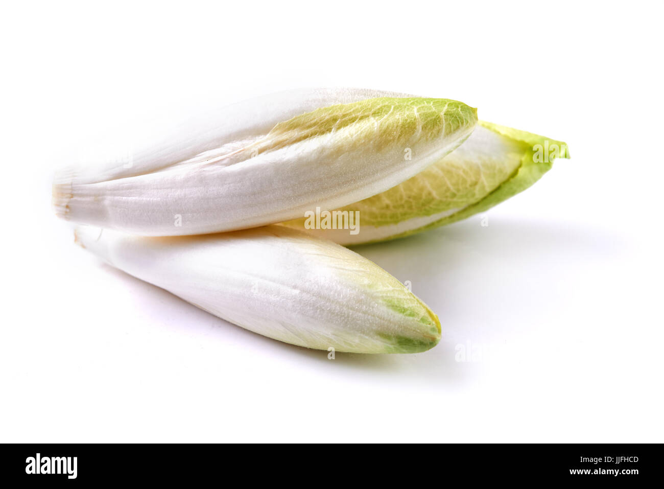 group of endive isolated on white background Stock Photo - Alamy