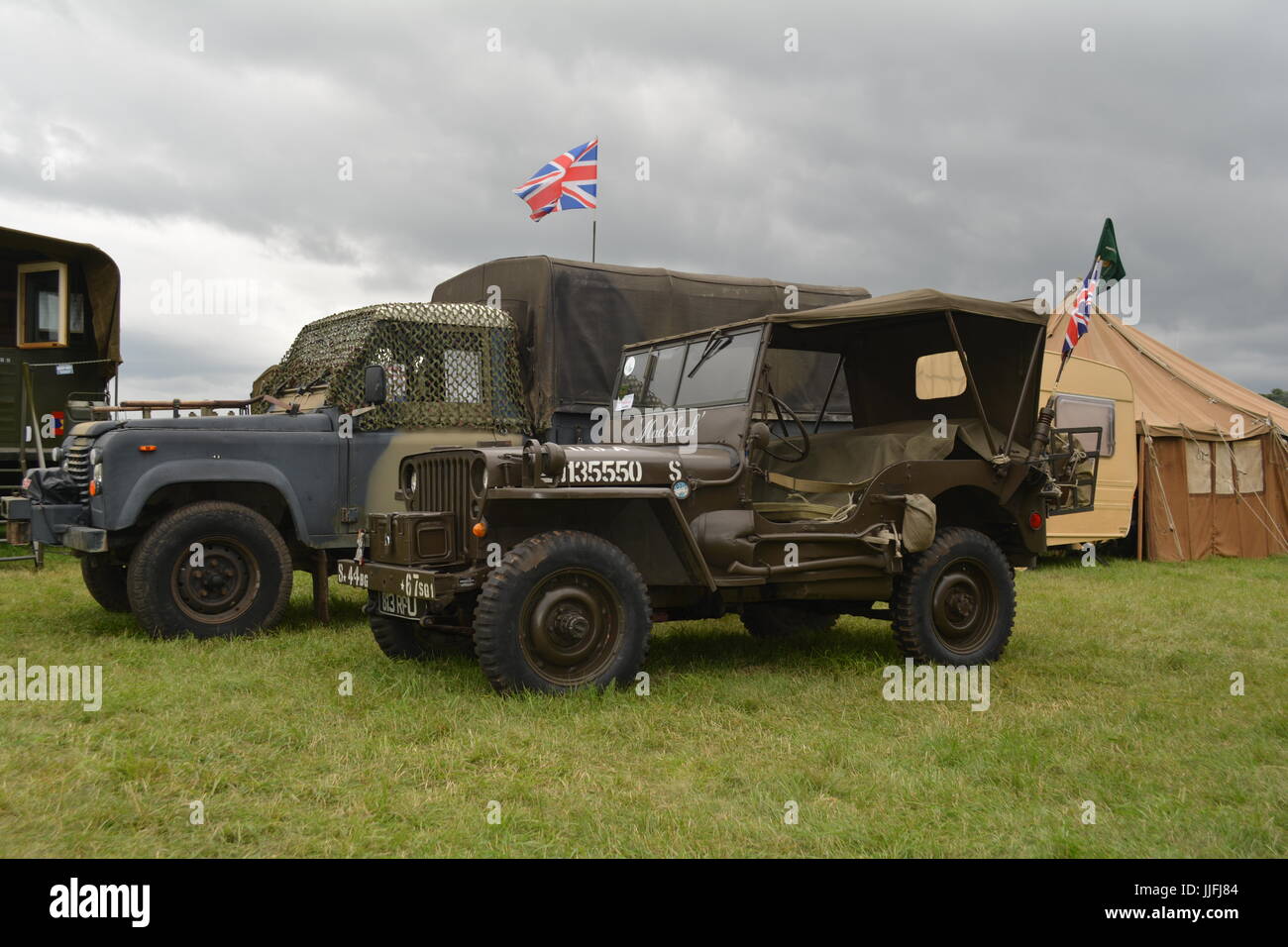 Army Jeep and truck parked side by side Stock Photo - Alamy