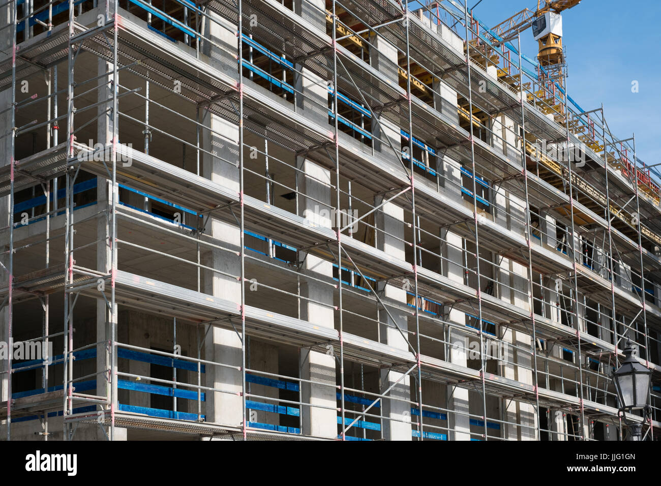 construction site, scaffolding on building facade Stock Photo - Alamy