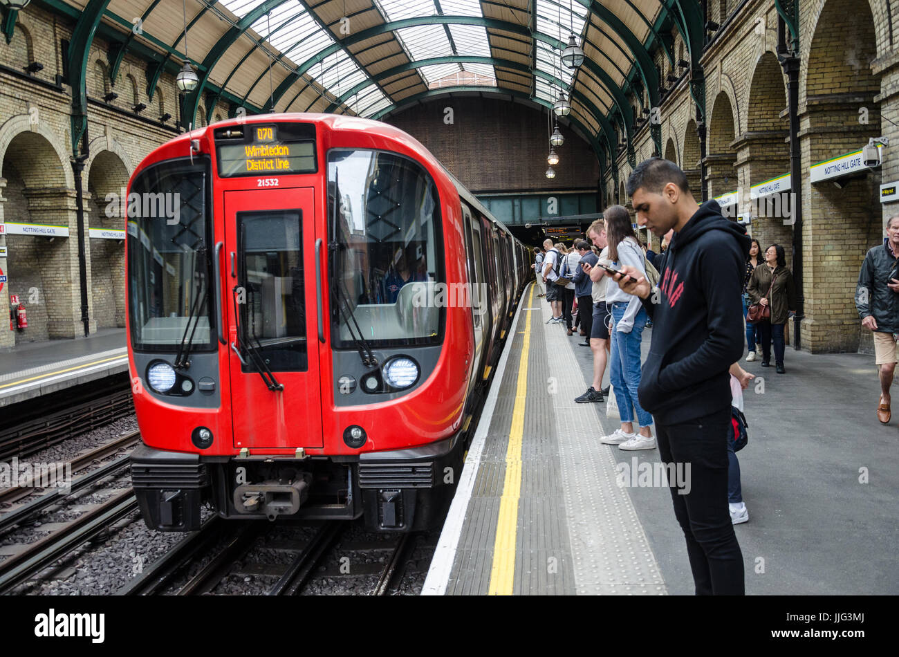 A train arrives in Notting Hill Gate London Underground station Stock ...