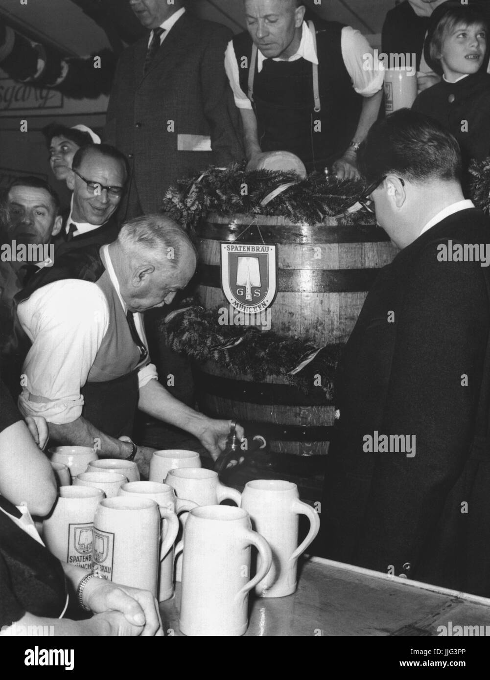 Former mayor Thomas Wimmer taps the first barrel at the Oktoberfest ...