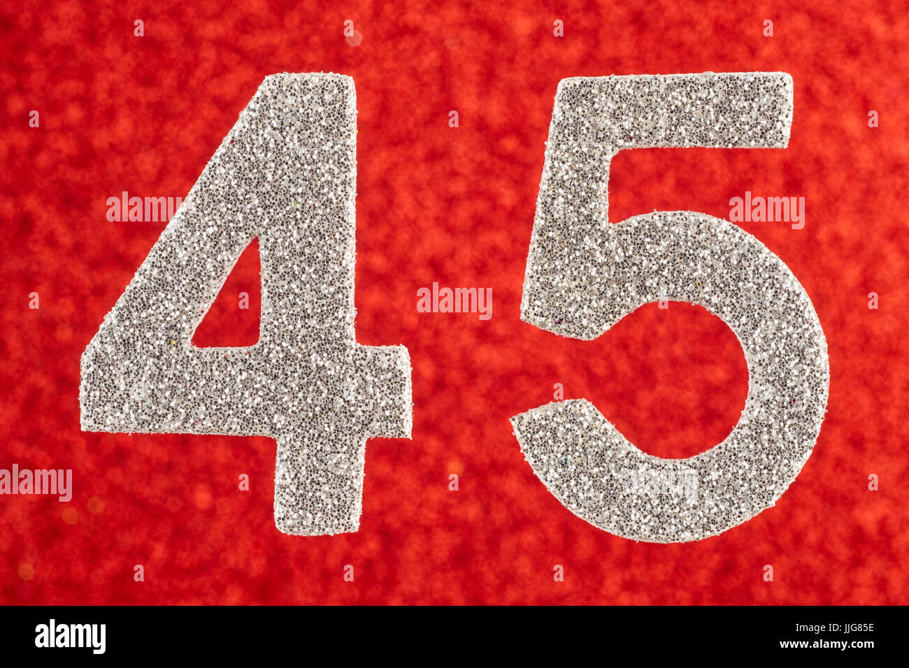 Number forty-five silver color over a red background. Anniversary ...
