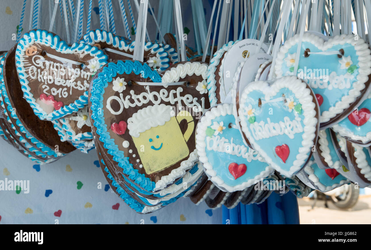 Gingerbread hearts with the inscription 'Oktoberfest' hang at a stall ...