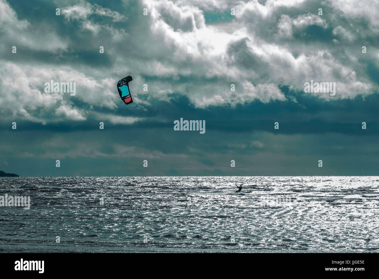 Kite boarding. Kitesurf freestyle at sunset Stock Photo - Alamy
