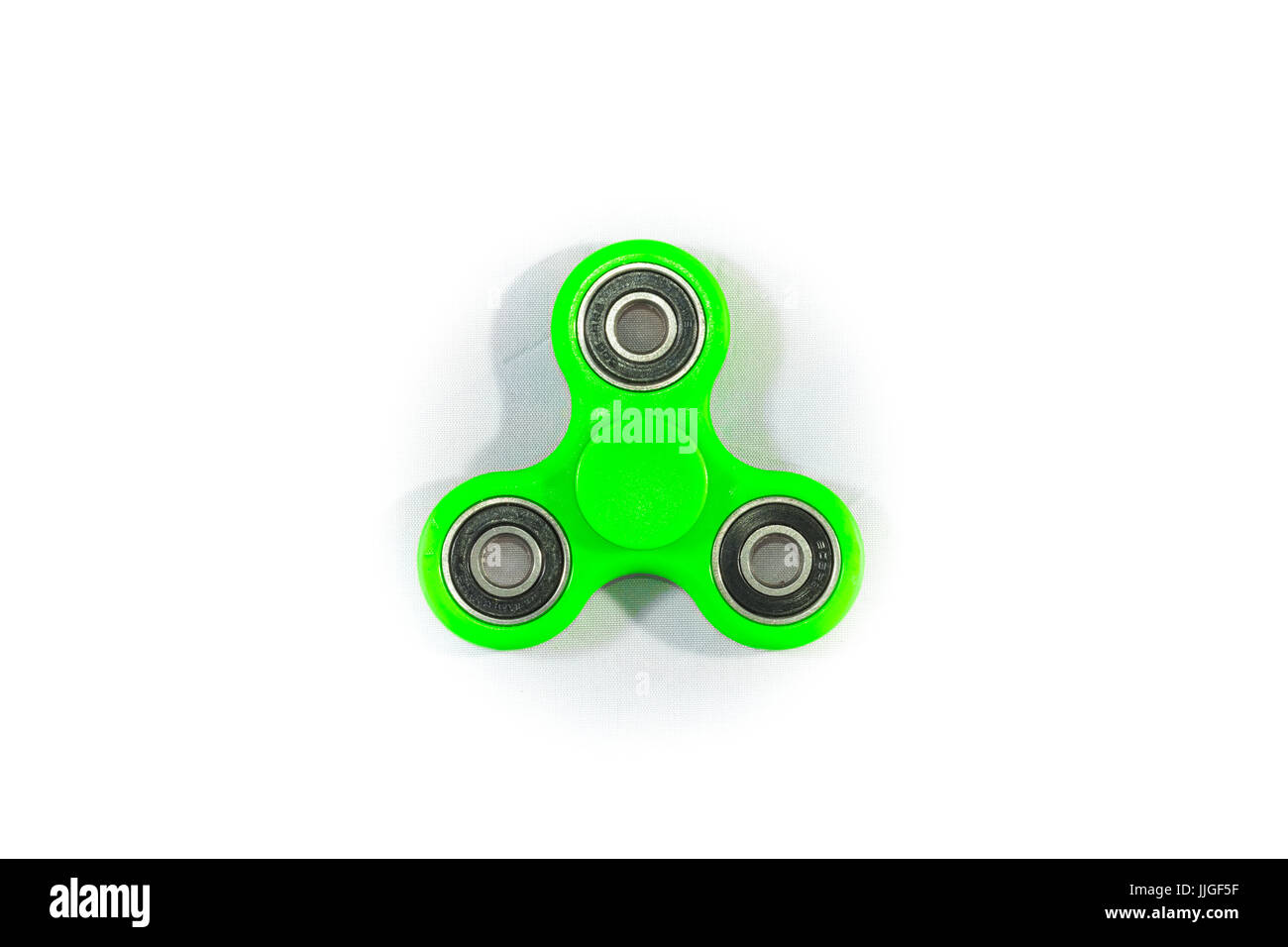 Fidget Spinner in white isolated background. The fidget spinner is a ...