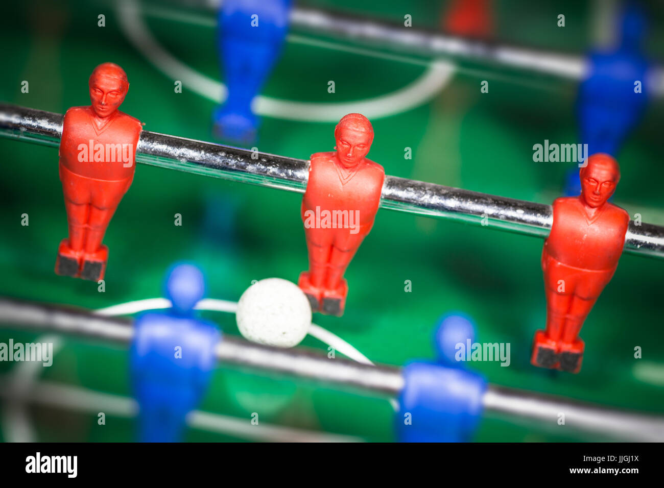 Close-up of football table Stock Photo - Alamy