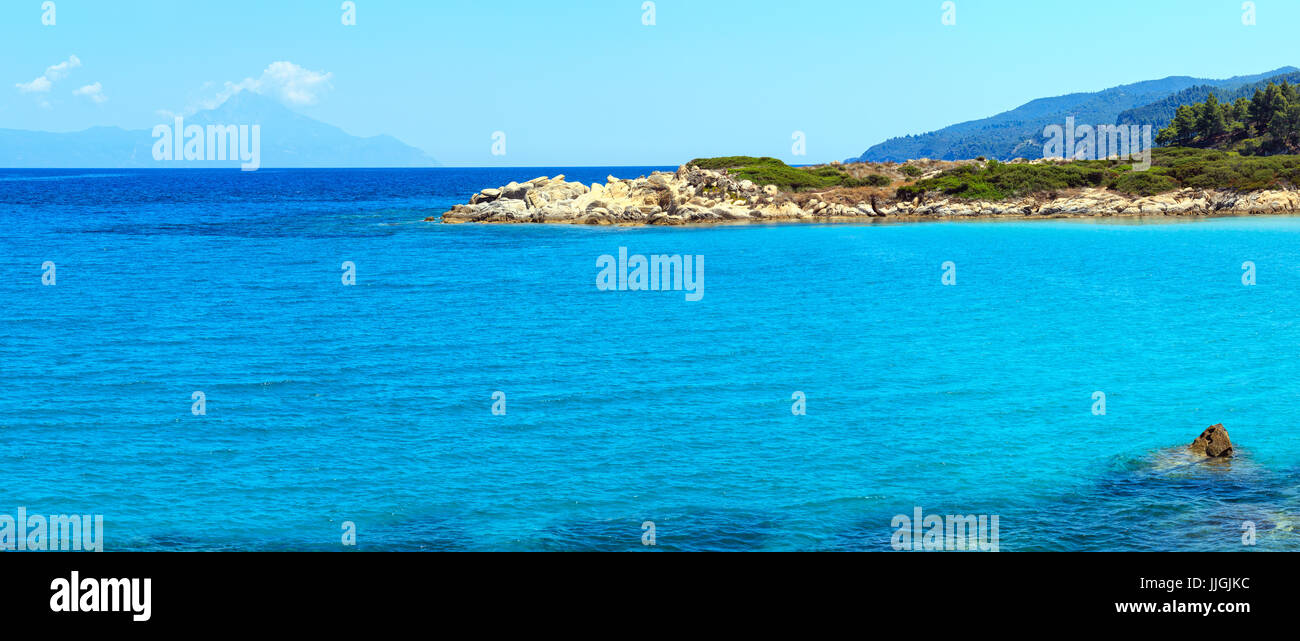 Aegean sea coast landscape with aquamarine water and Mount Athos in ...