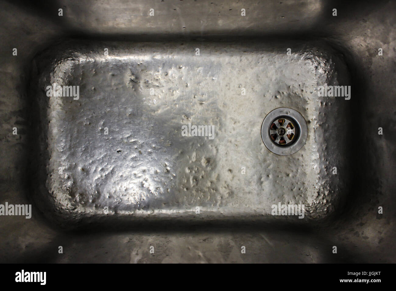 Stainless steel used sink zoomed Stock Photo - Alamy