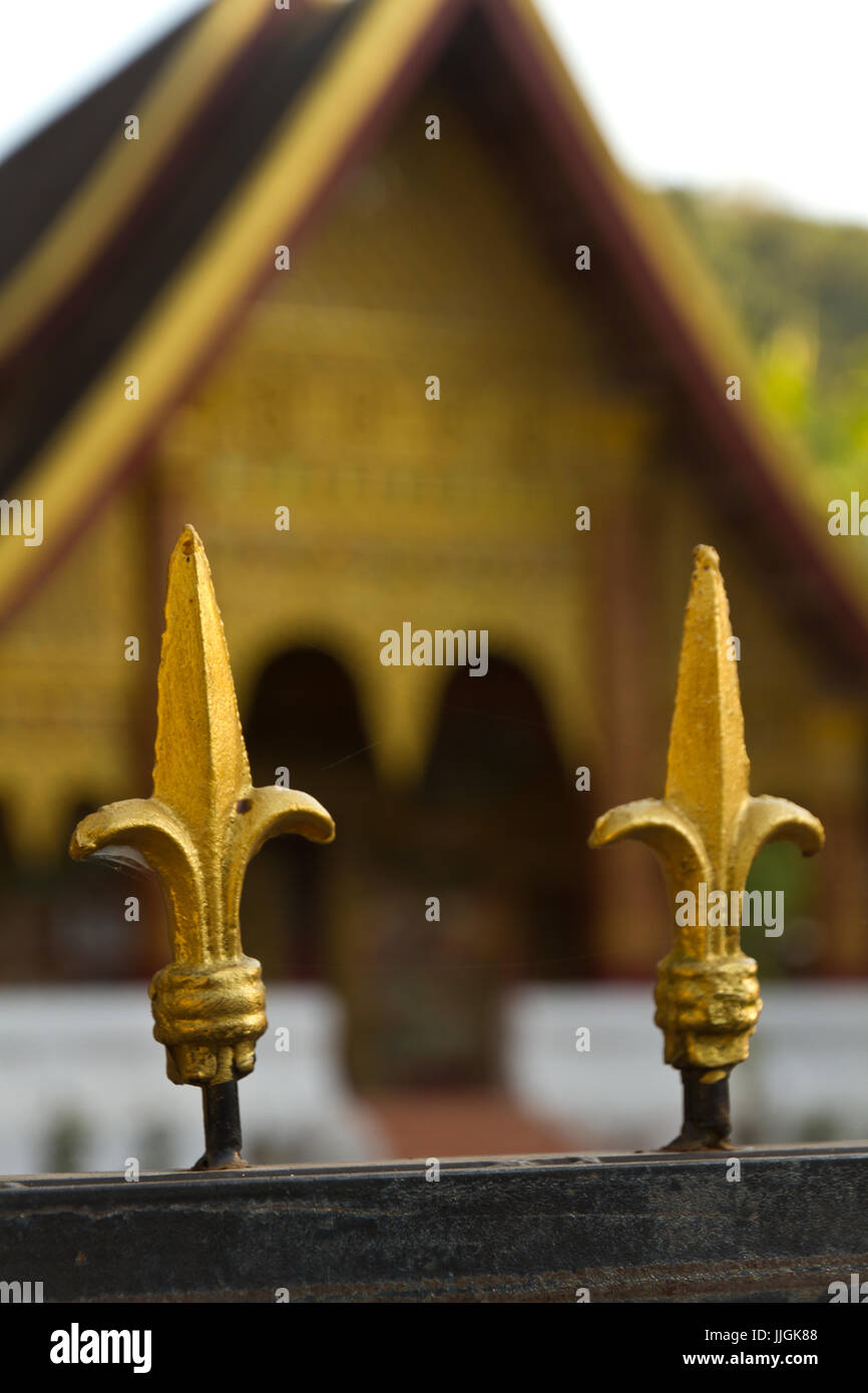 Gold and black wrought iron gate Stock Photo - Alamy