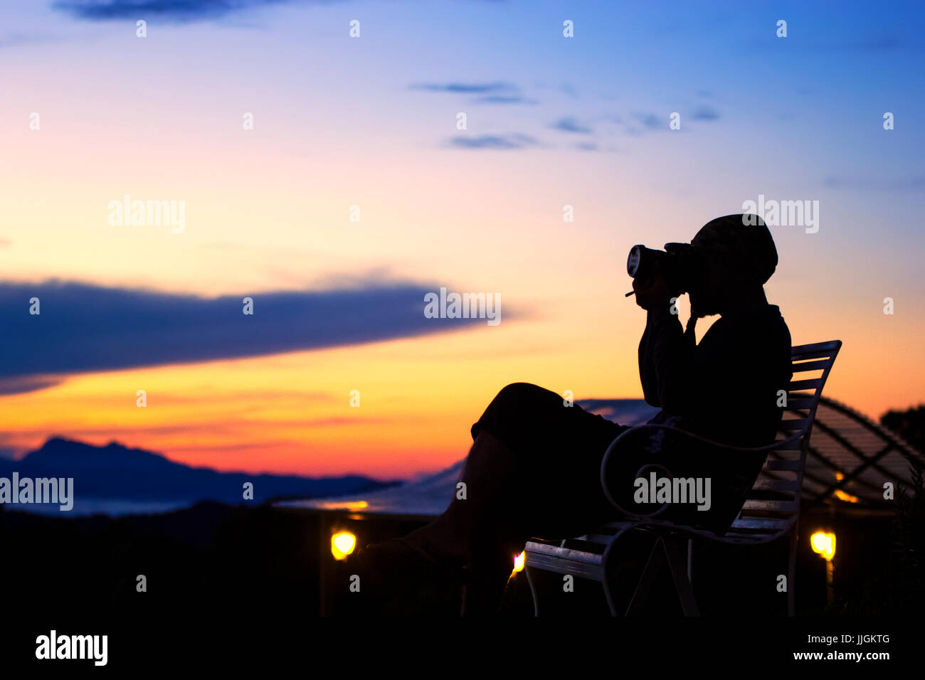 Silhouette man sitting sunset in hi-res stock photography and images ...