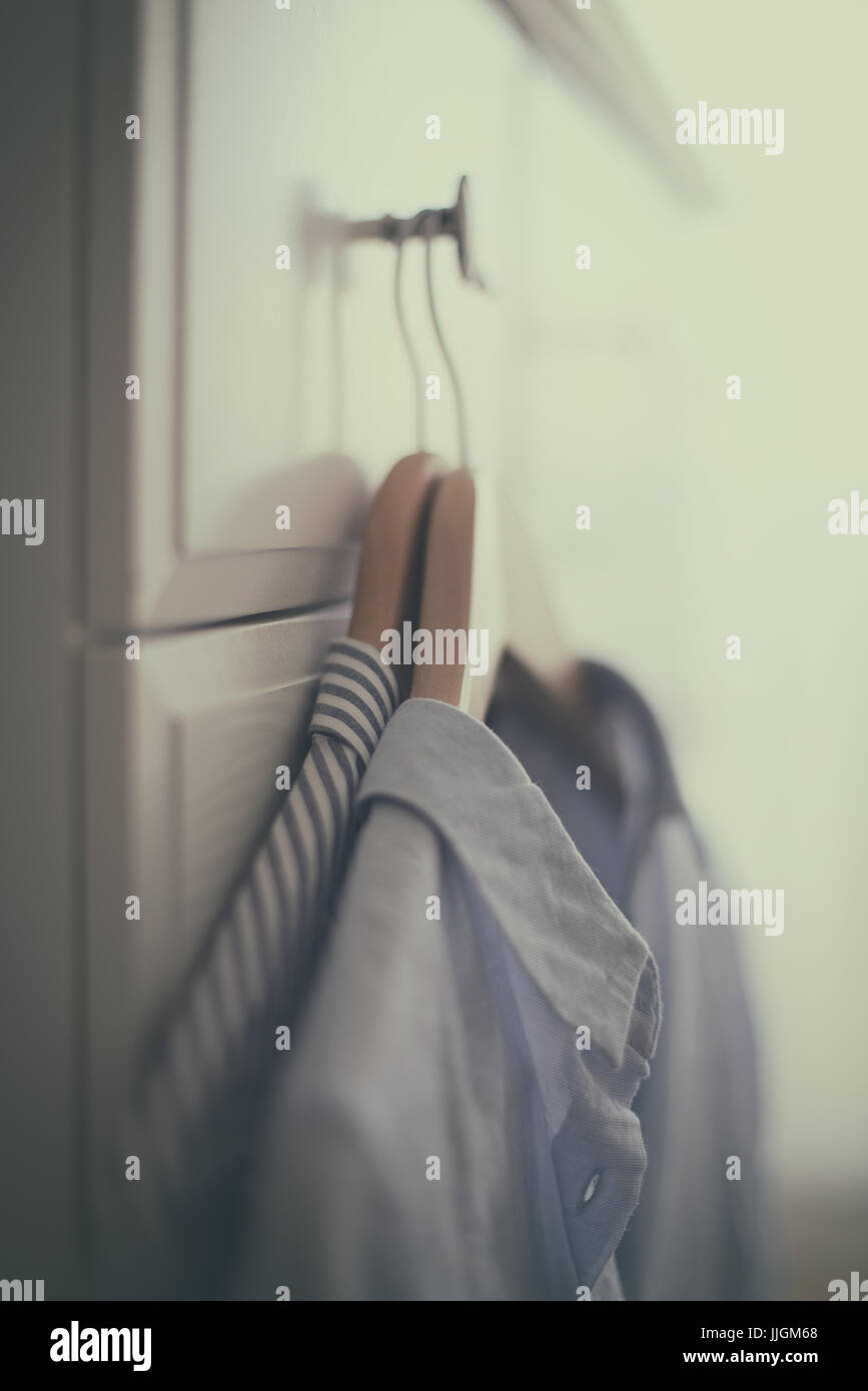 Hanging up coat hi-res stock photography and images - Alamy