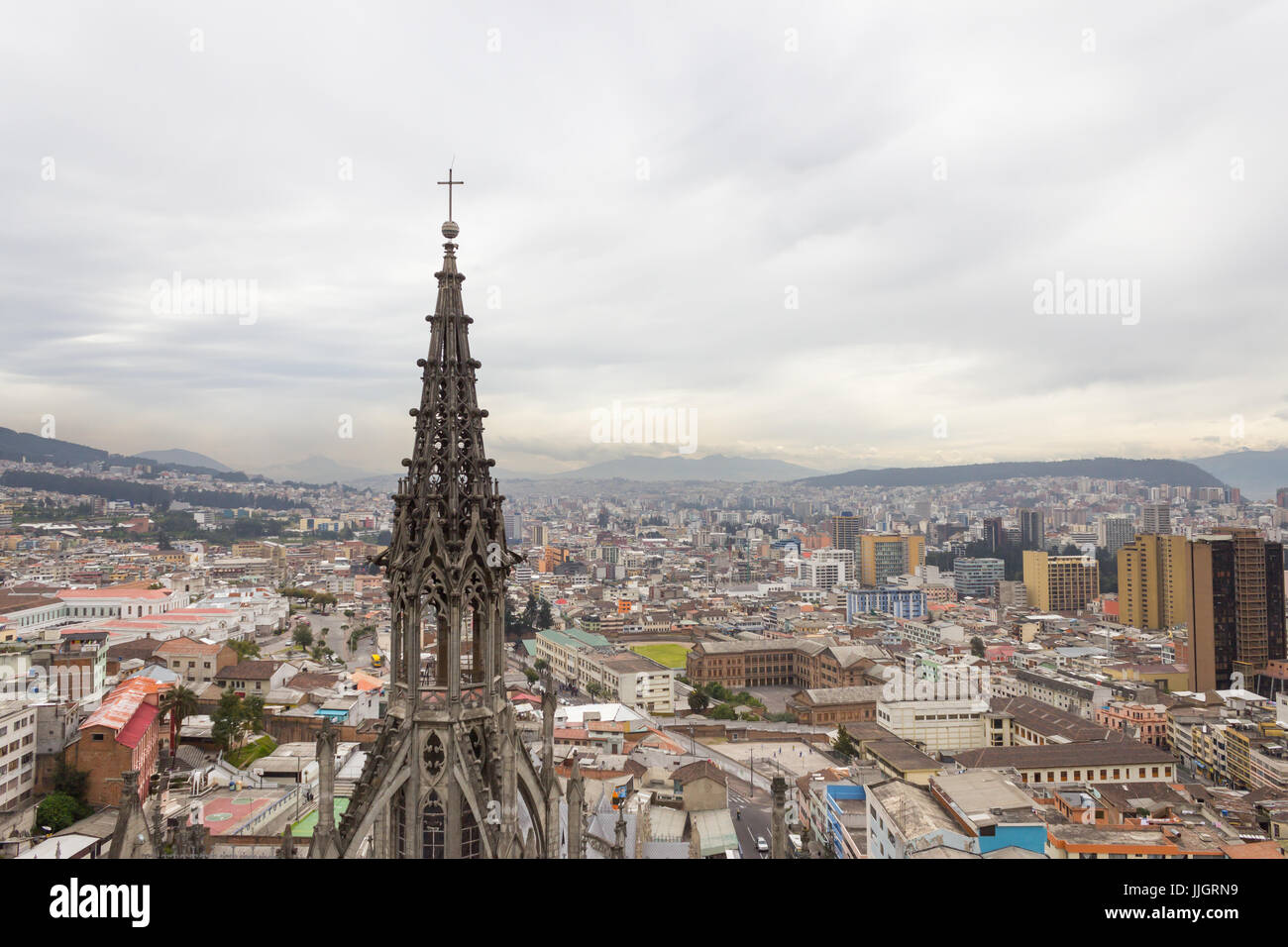 Aerial view of the city of Quito,with a top part of Basilica church ...