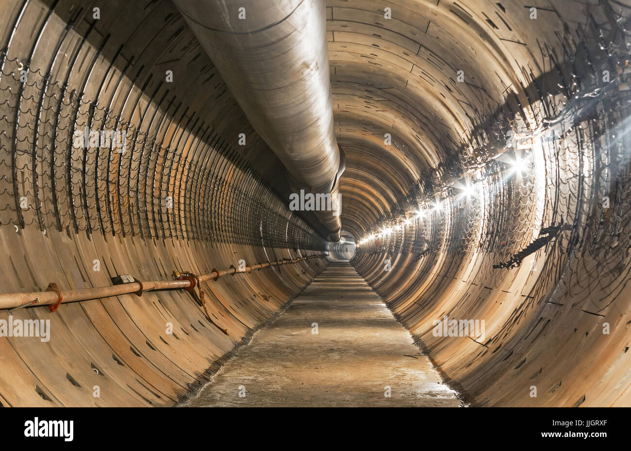 Empty tunnel under construction for the metro. Large temporary ...