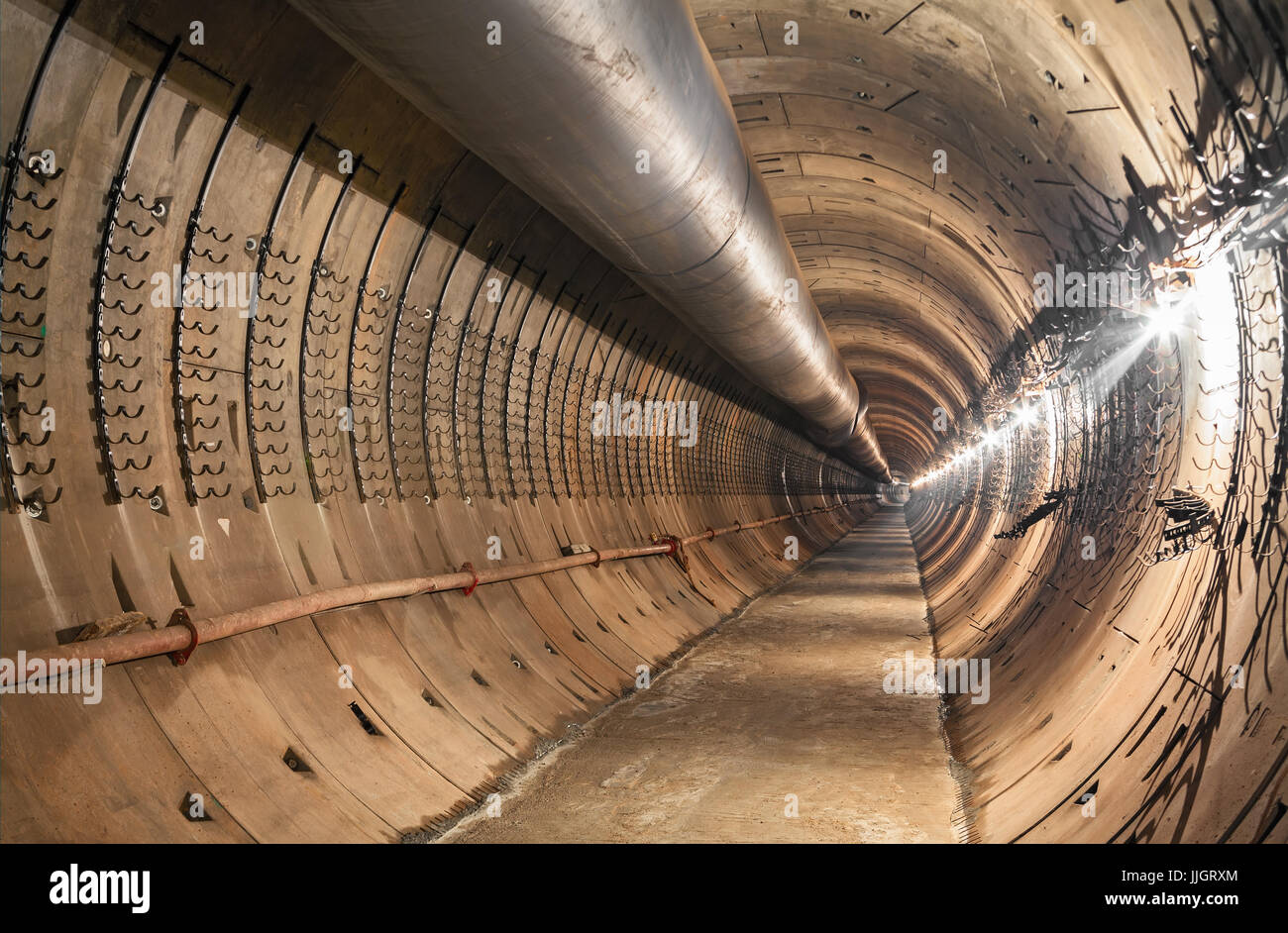 Empty tunnel under construction for the metro. Large temporary ...