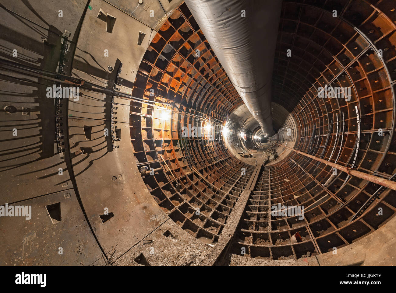 Empty tunnel under construction for the subway. Large temporary ...