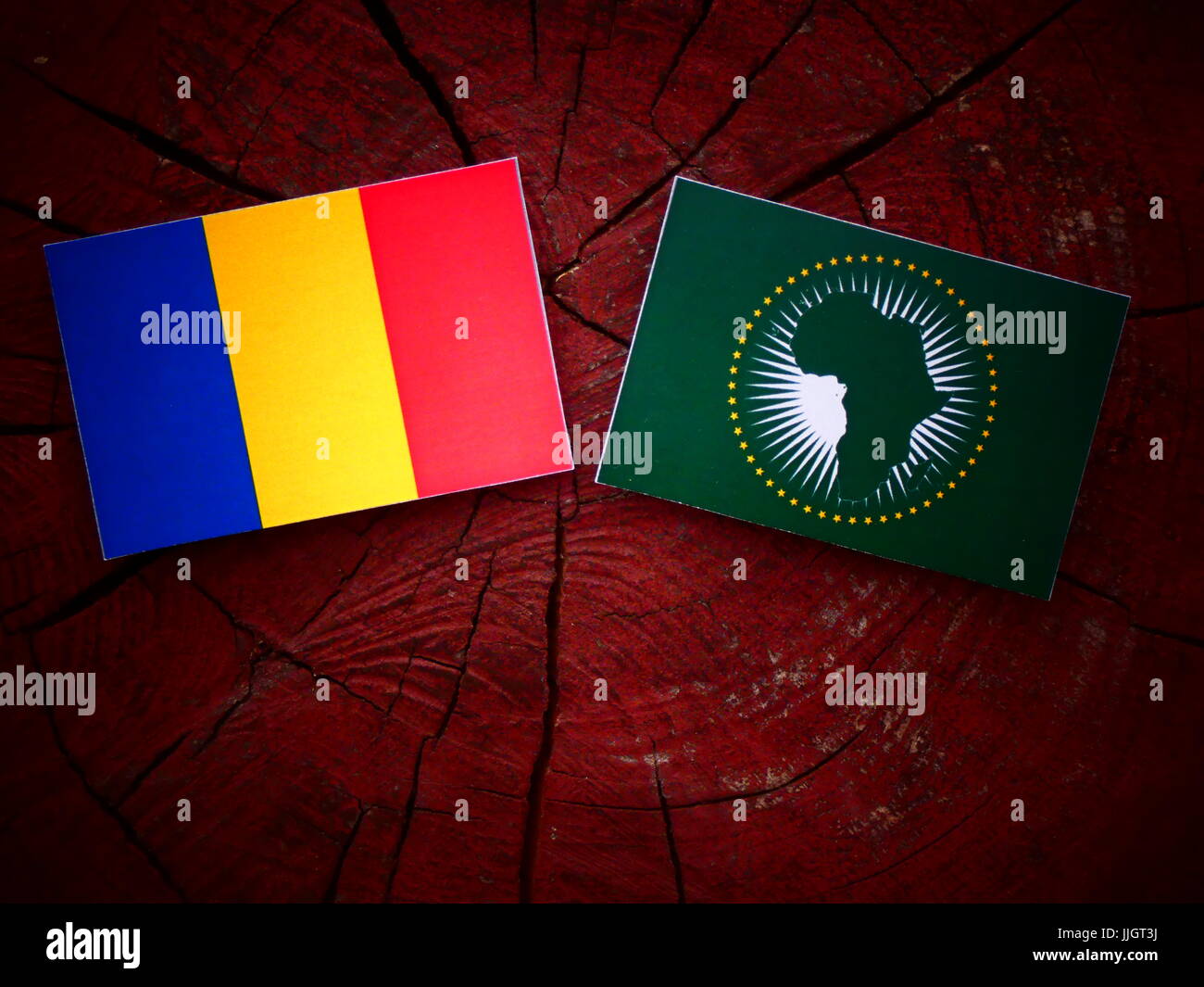 Chad flag with African Union flag on a tree stump isolated Stock Photo ...