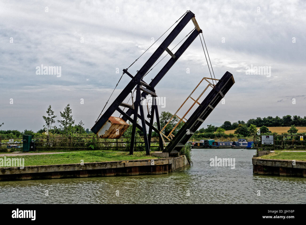 Lift bridge in upright position at marina Stock Photo - Alamy