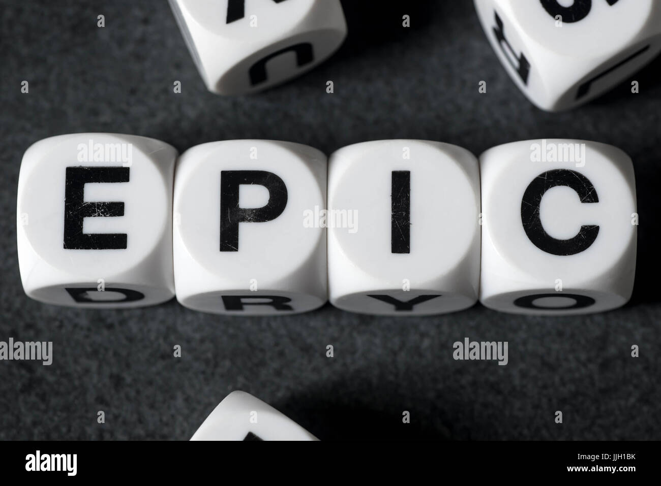 word epic on white toy cubes Stock Photo - Alamy