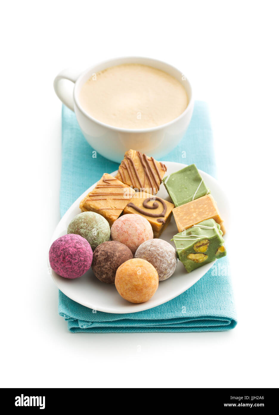 Various sweet candies and coffee cup with coffee Stock Photo - Alamy