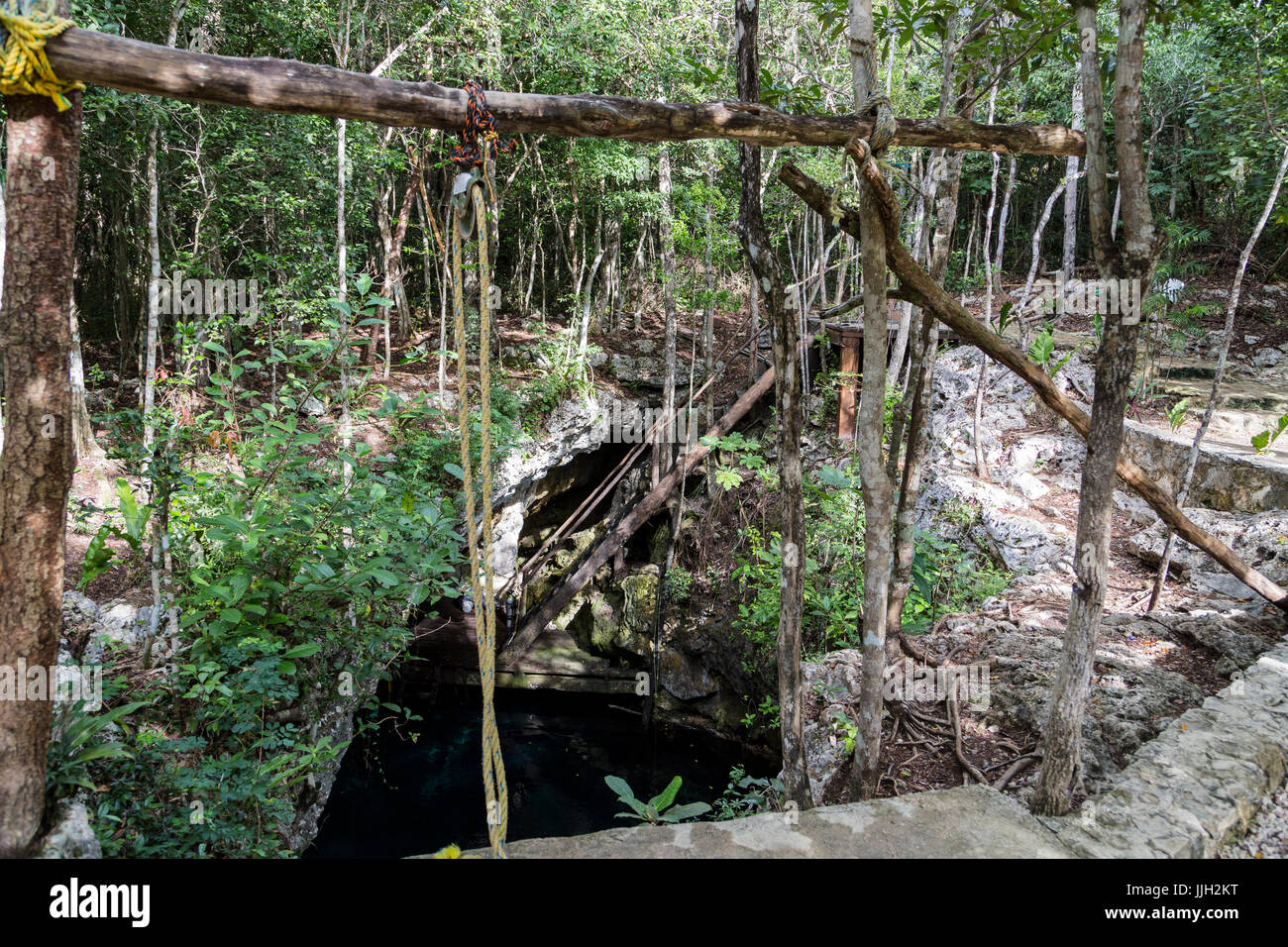 A view of the famed The Pit cenote, a deep sinkhole popular with divers ...