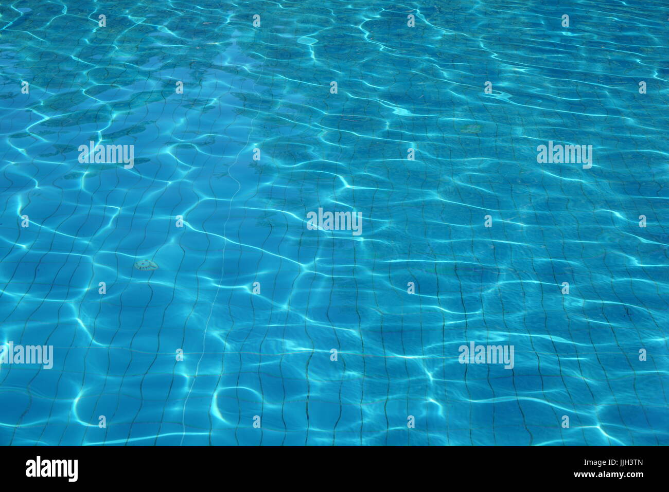 Blue swimming pool water Stock Photo - Alamy