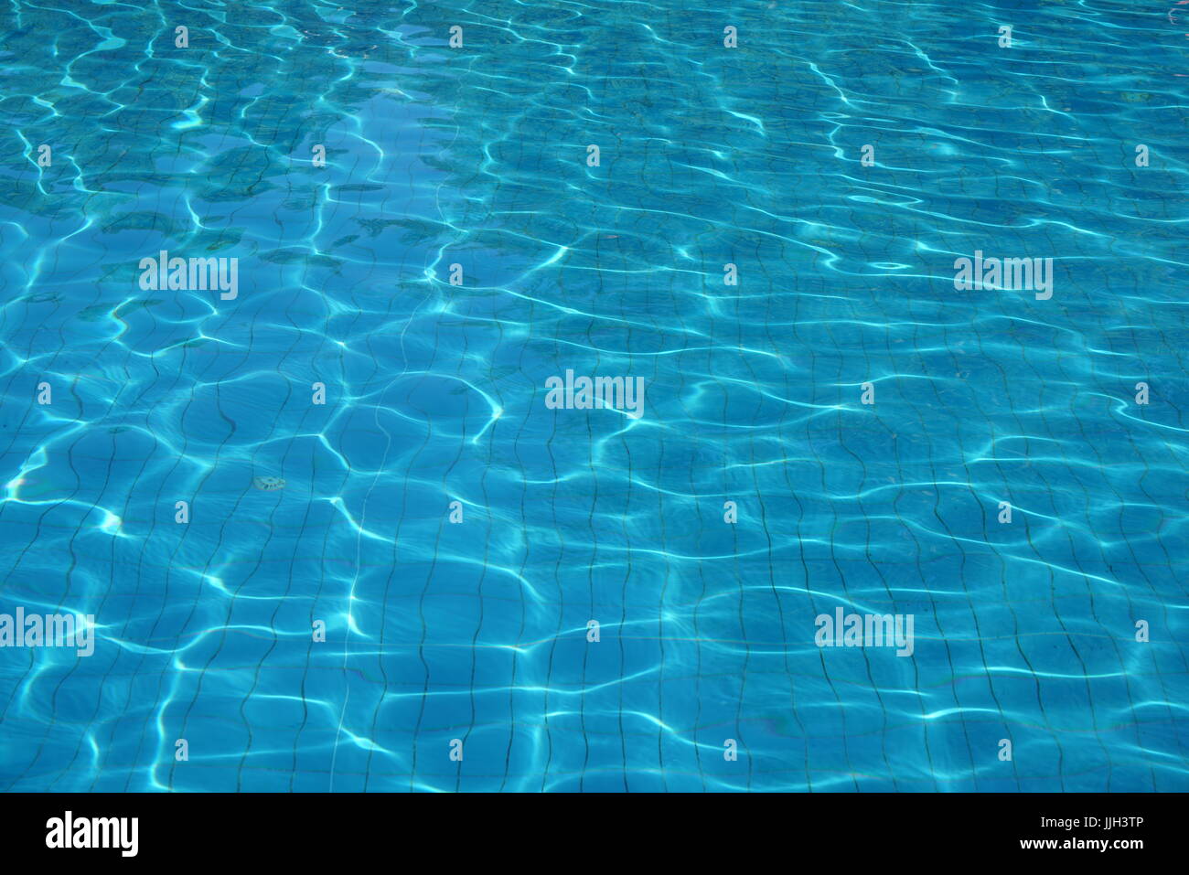 Blue swimming pool water Stock Photo - Alamy
