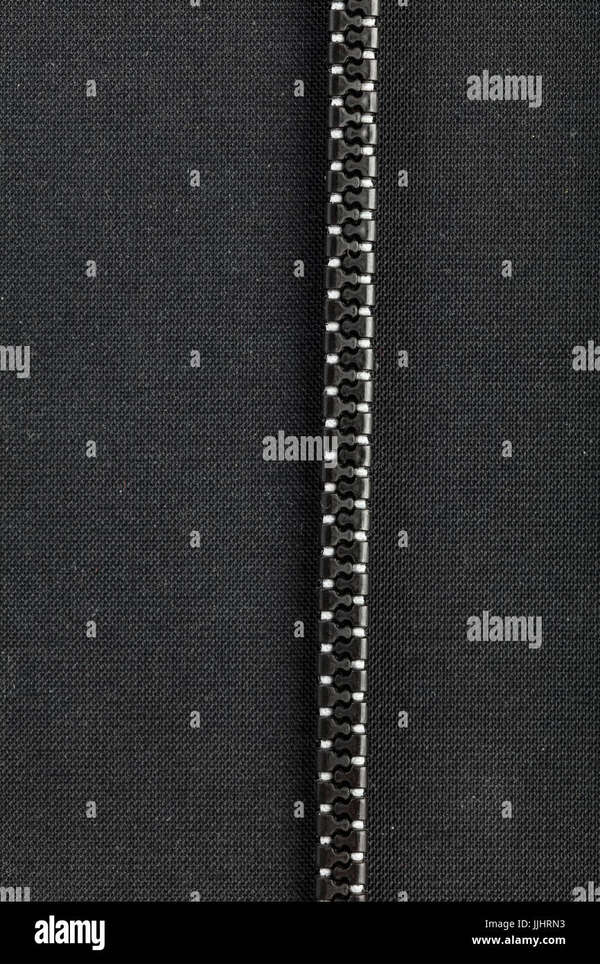 black plastic zipper with black background and copy space Stock Photo ...