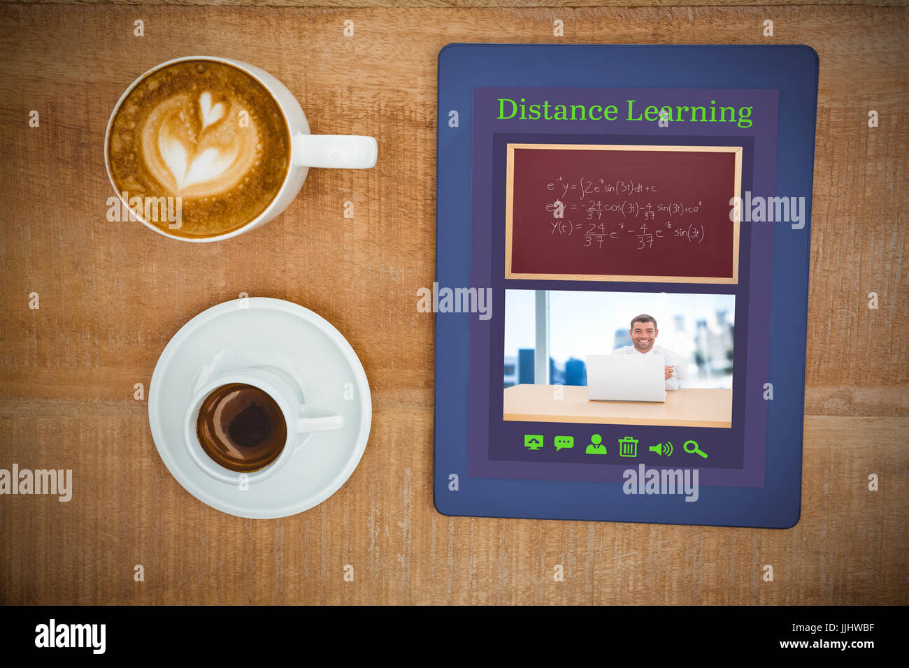 Digital image of e-learning interface against above view of coffee and ...