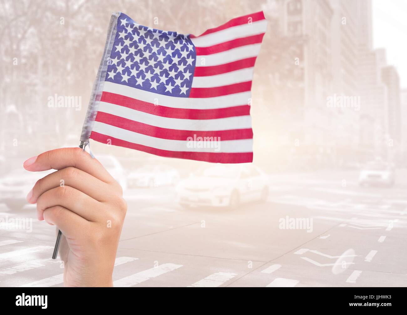Hand holding american flag Stock Photo - Alamy