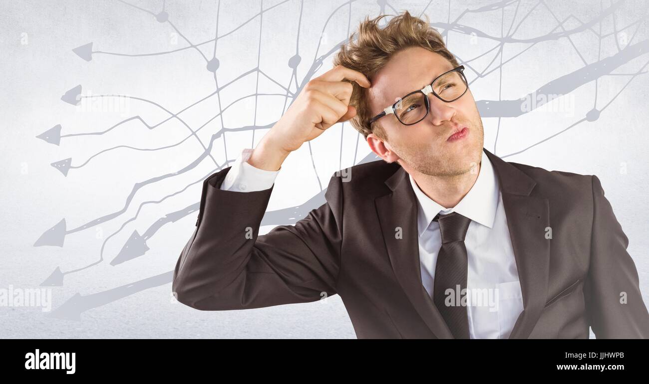 Frustrated business man against white wall and graph Stock Photo - Alamy