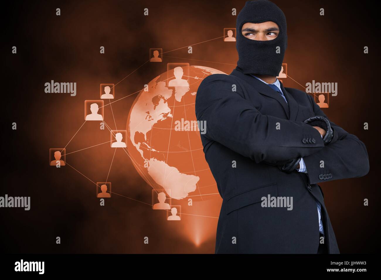 Hacker standing in front of orange planet Stock Photo - Alamy