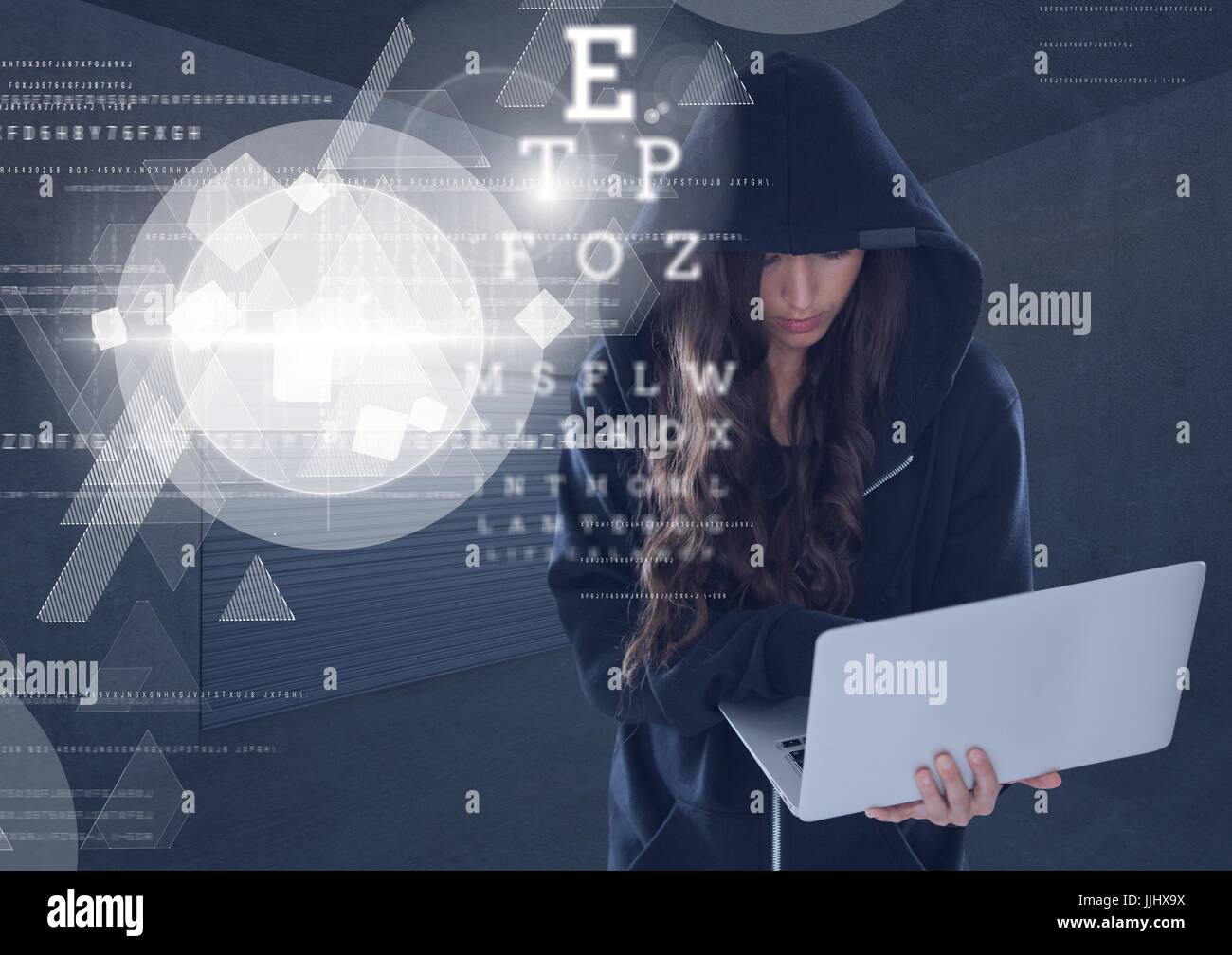 Woman hacker using a laptop in front of 3d digital background Stock ...