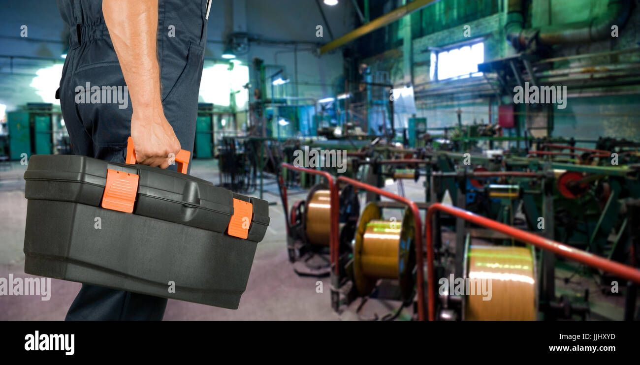Worker with instruments Stock Photo - Alamy