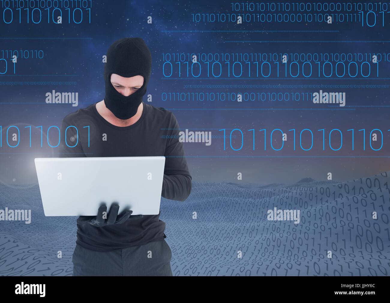 Hacker using a laptop in front of digital numbers Stock Photo - Alamy