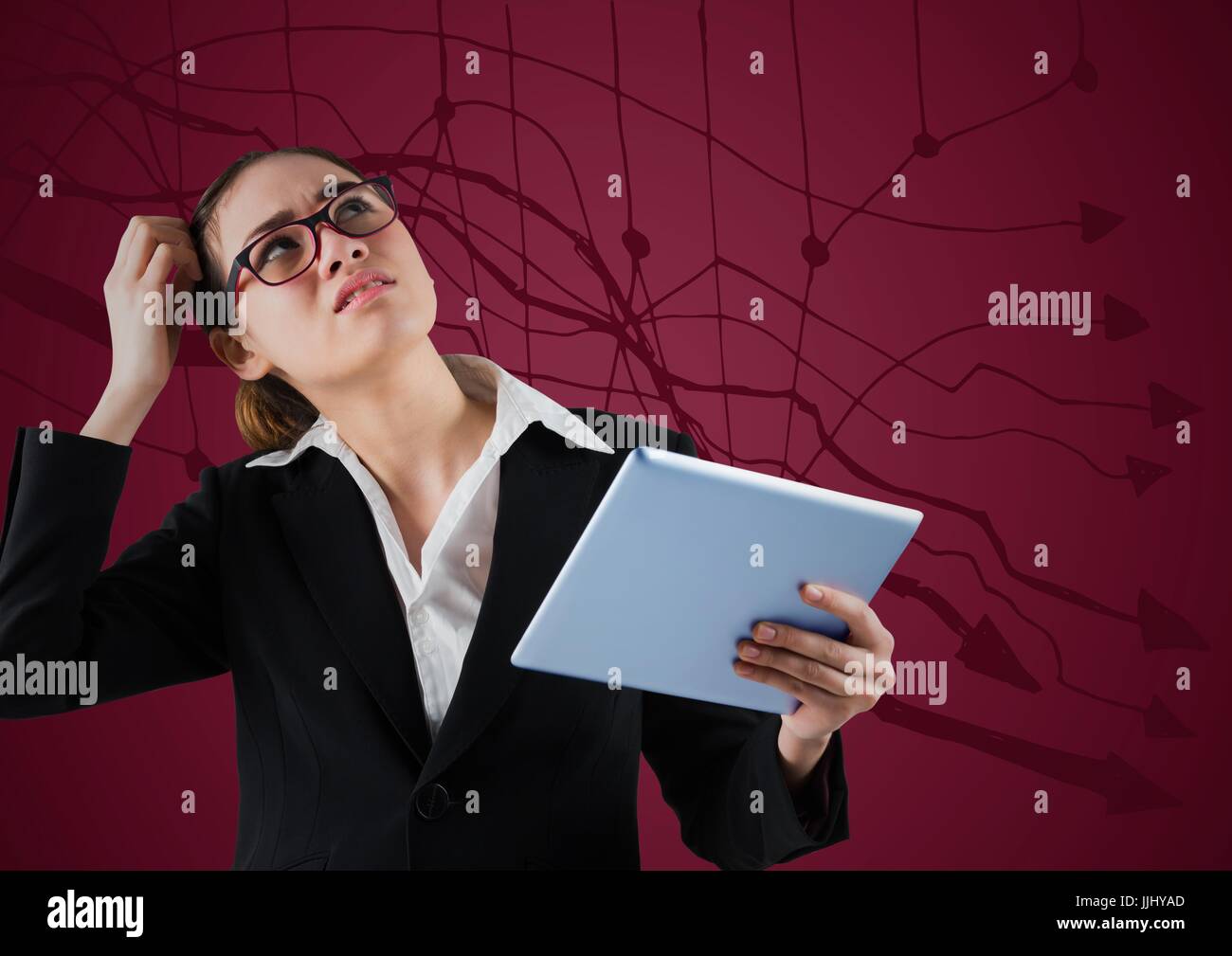 Frustrated business woman with tablet against maroon background and ...