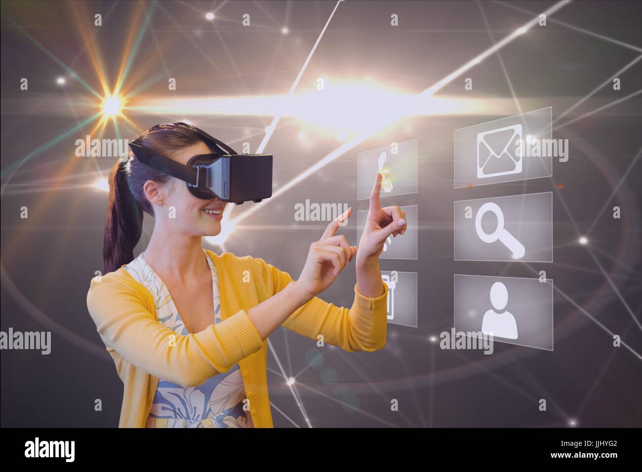 Composite image of woman using virtual reality Stock Photo - Alamy