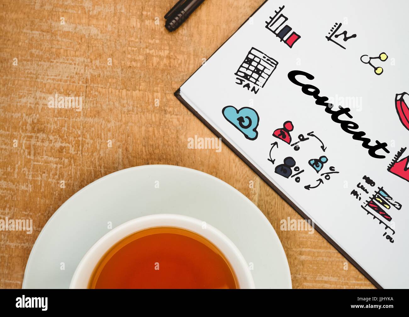 Office table notepad computer tea hi-res stock photography and images ...