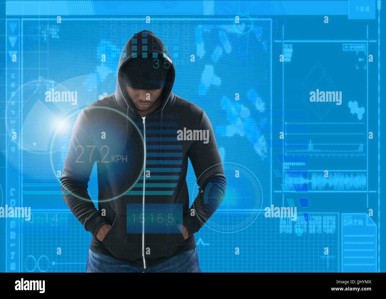 hacker with arms in pocket in front of blue digital background Stock ...