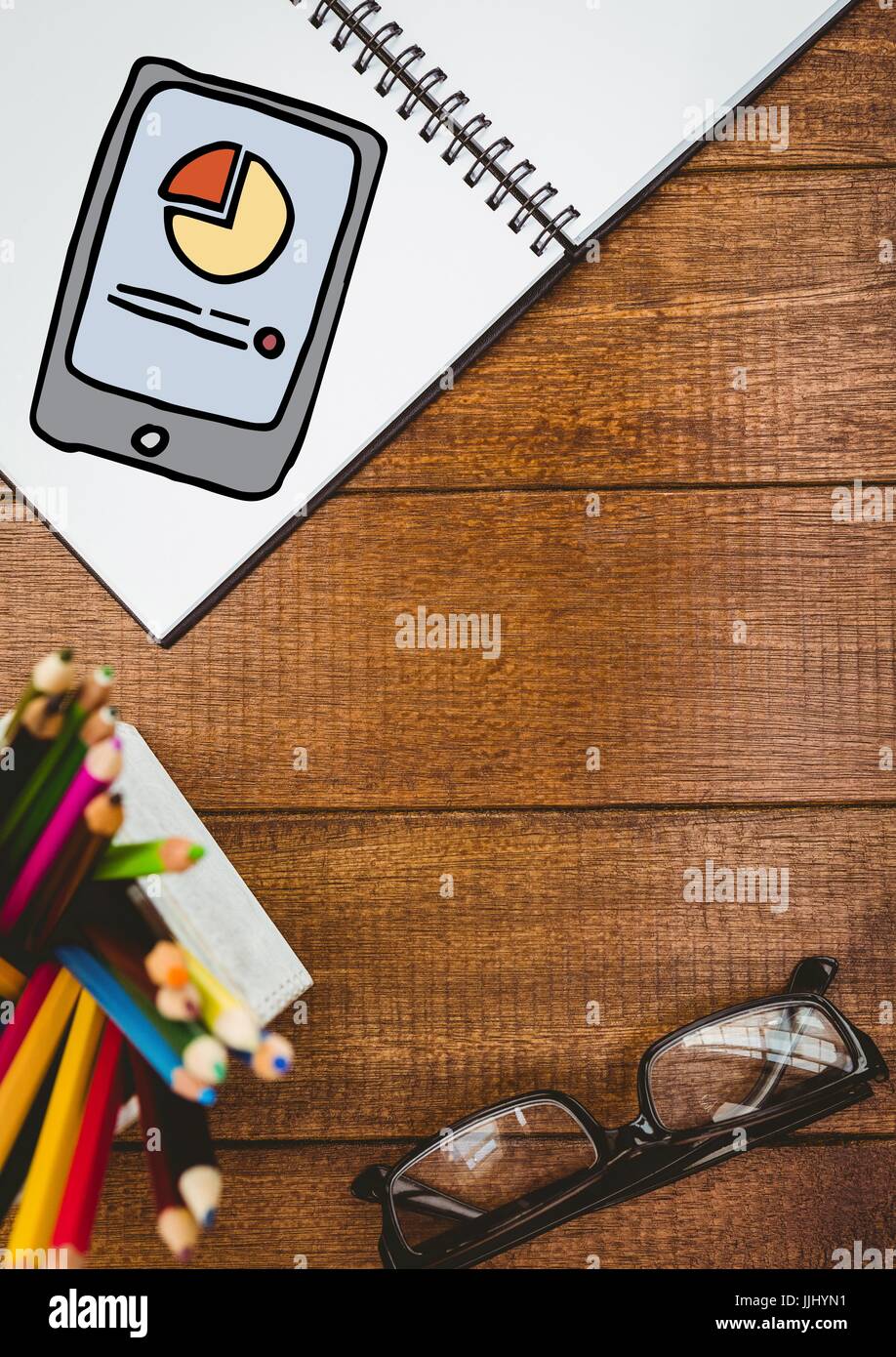 Device doodle on notepad next to glasses and pencils Stock Photo - Alamy