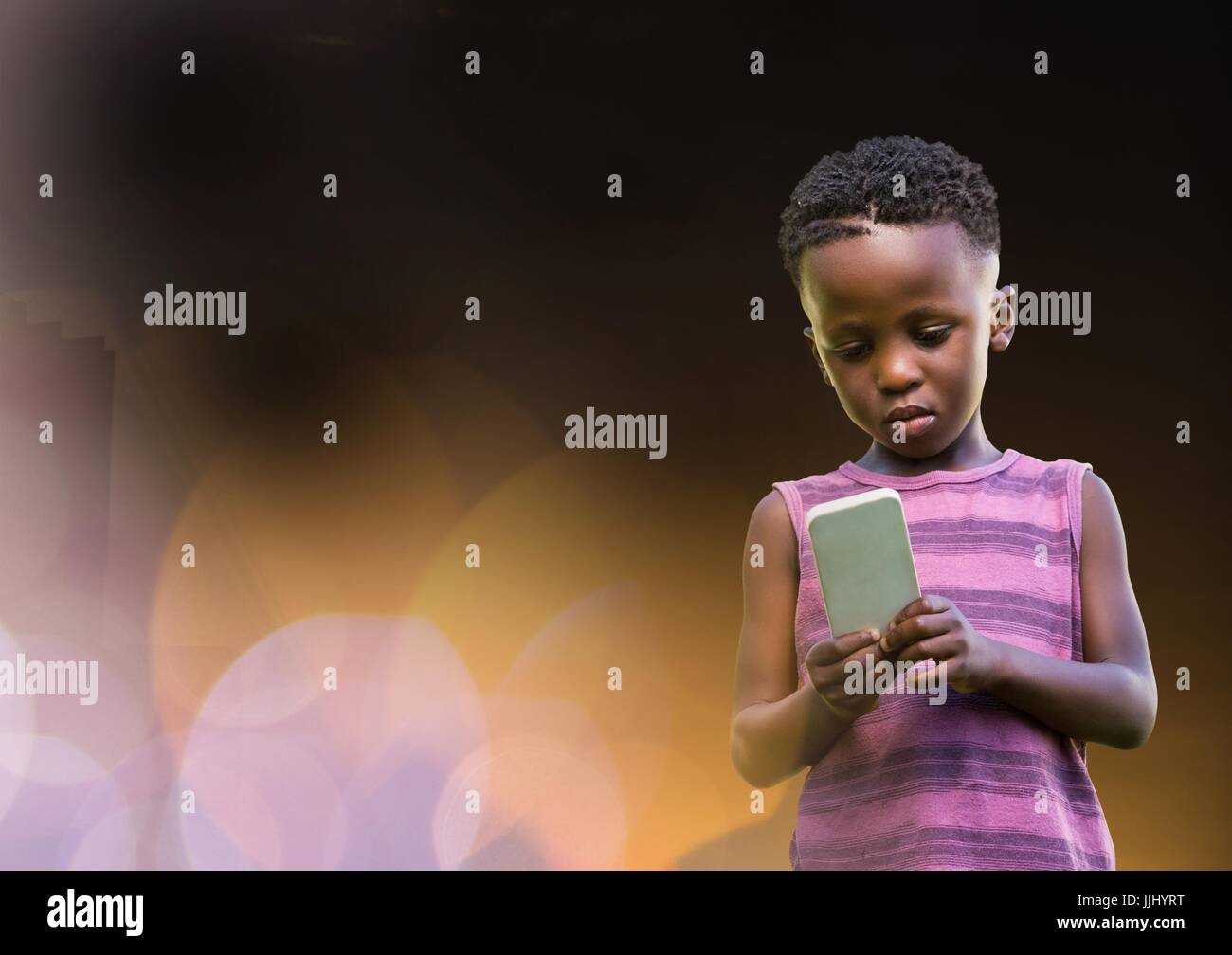 Boy child texting hi-res stock photography and images - Alamy