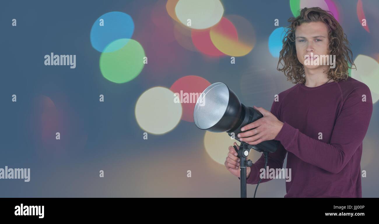 Photographer in front of lights Stock Photo - Alamy